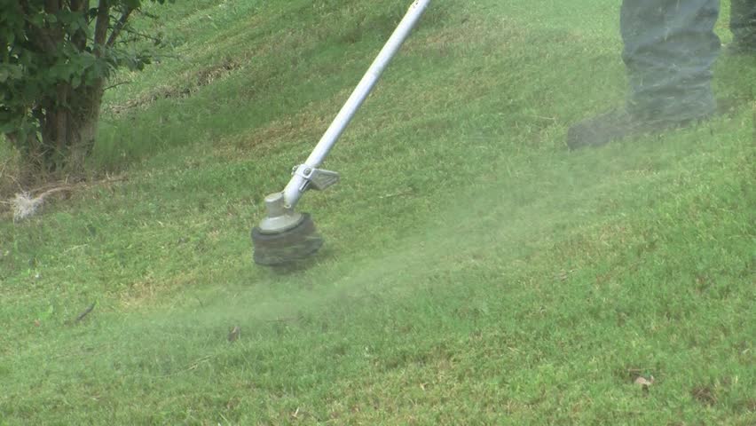 Man Using Weed Wacker Stock Footage Video (100% Royalty-free) 5650100 ...