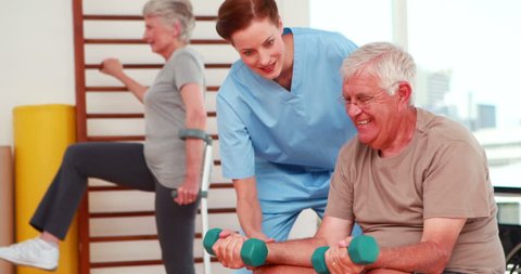 Senior Citizens Exercising Physiotherapist Gym Stock Footage Video (100 ...