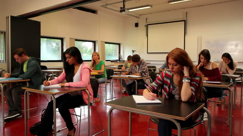 front view caucasian students sitting classroom Stock Footage Video ...