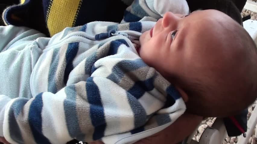 Cradling a Child in Arms Stock Footage Video (100% Royalty-free ...