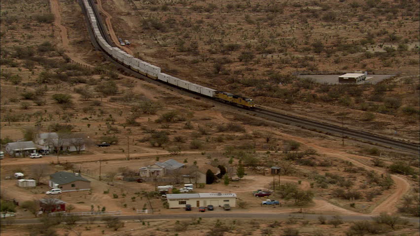 Desert Train Next to Town. Stock Footage Video (100% Royalty-free ...
