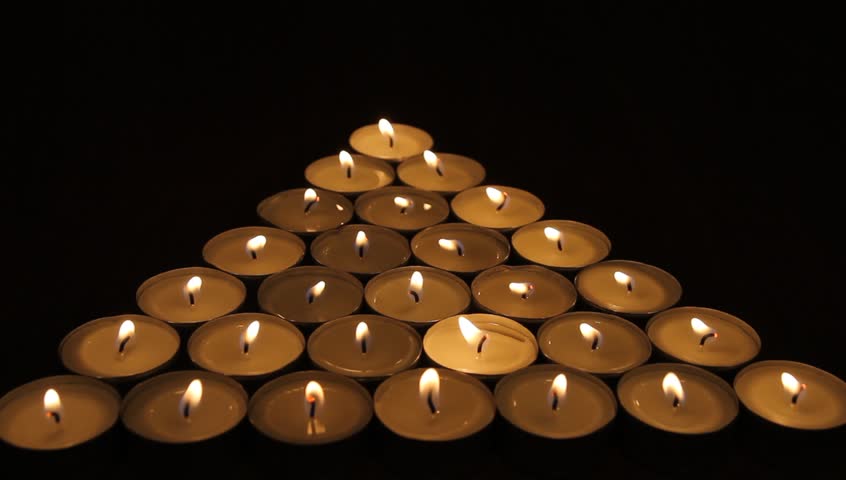 many tea light candles dark close-up Stock Footage Video (100% Royalty ...