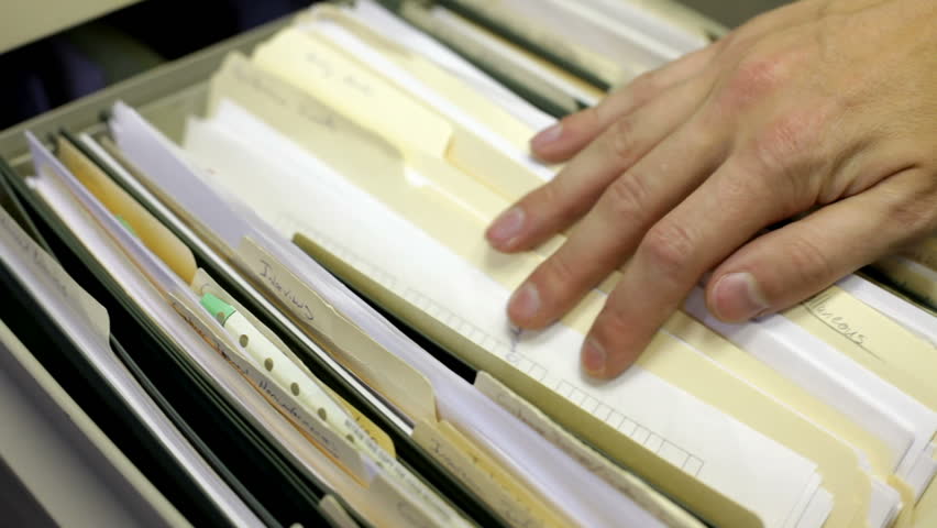 looking through files desk drawer Stock Footage Video (100% Royalty ...