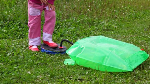 Little Girl Pumps Inflatable Armchair Headless Stock Footage Video (100 ...