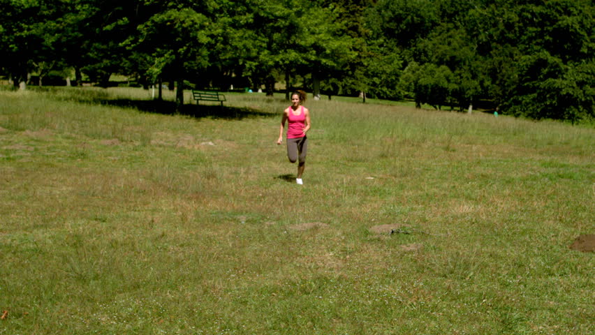 Fit Woman Sprinting Towards Camera Stock Footage Video (100% Royalty ...