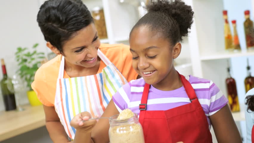 Ethnic Mom Kitchen Counter Young Daughter Stock Footage Video 100 Royalty Free 5974040