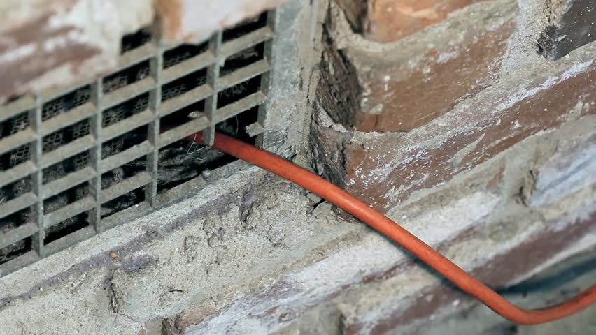 red extension cord pulled through older Stock Footage Video (100% ...