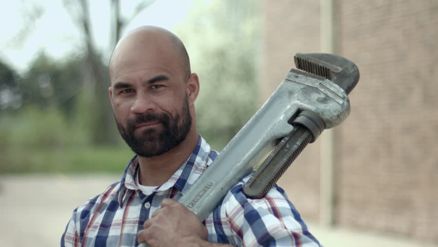Workman with a Giant Wrench, Stock Footage Video (100% Royalty-free ...