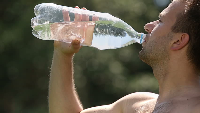 man drinking water plastic bottle nature Stock Footage Video (100% ...