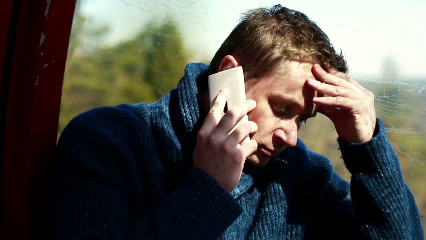 sad man talking on phone travelling Stock Footage Video (100% Royalty ...