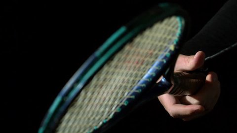 Hand Spinning Tennis Racket On Black Stock Footage Video (100% Royalty ...