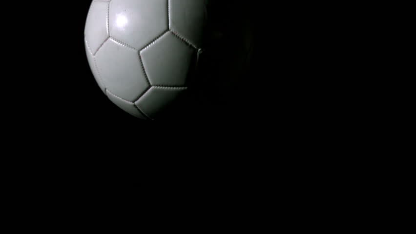 Football Moving Across Black Background Slow Stock Footage Video (100% ...