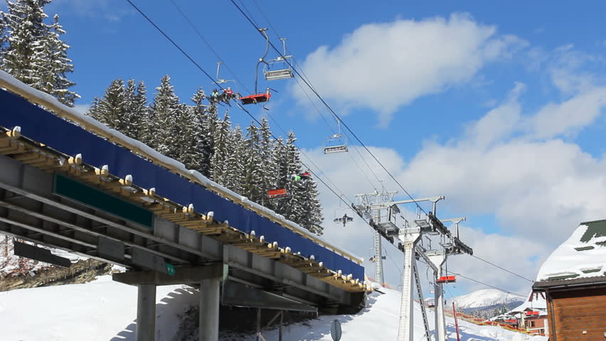 ski lifts moving over pedestrian bridge Stock Footage Video (100% ...