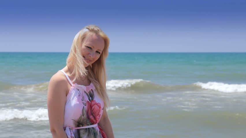 Beautiful Blond Girl Enjoying Herself Stock Footage Video 100 Royalty