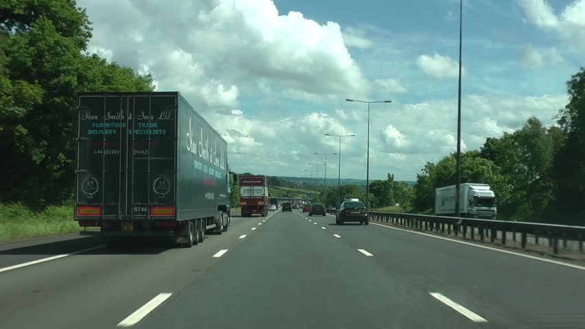 Front View of Cars Going 库存影片视频（100% 免版税）6570479 | Shutterstock
