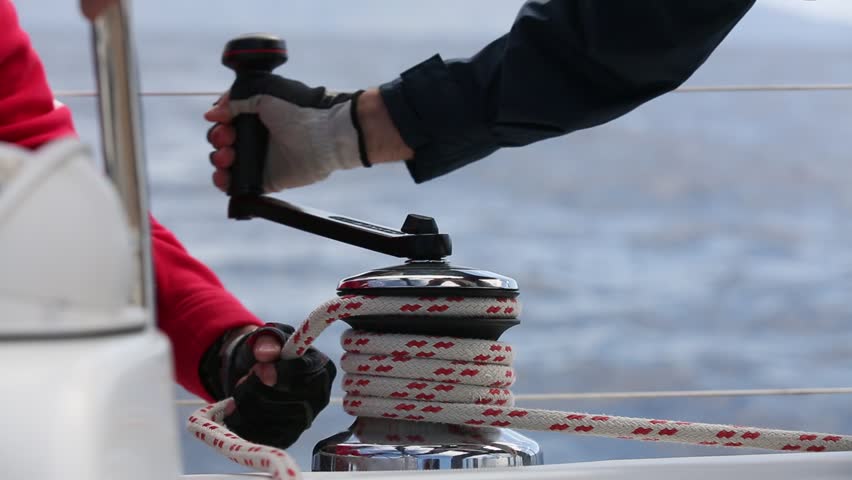 man pulling ropes winding sheets around Stock Footage Video (100% ...