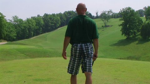 「Golfer Getting Into Stance Teeing Off」の動画素材（ロイヤリティフリー）674005 ...