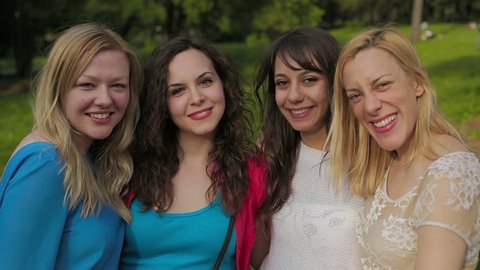 four beautiful girls laughing park friendship Stock Footage Video (100% ...