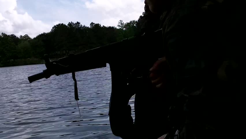 closeup camouflage uniform swimming fins weapon Stock Footage Video ...