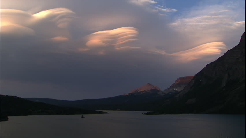 round disc shaped clouds float above Stock Footage Video (100% Royalty ...