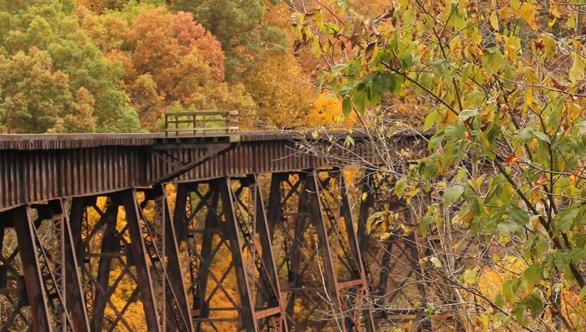 railroad bridge beautiful fall trees colors Stock Footage Video (100% ...