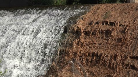 Clear Treated Waterfall Abuts Muddy Sludge Stock Footage Video (100% ...