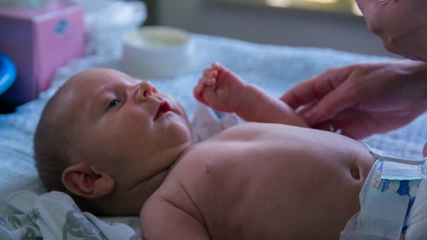 Mother Changing Her Babys Clothes Stock Footage Video (100% Royalty ...