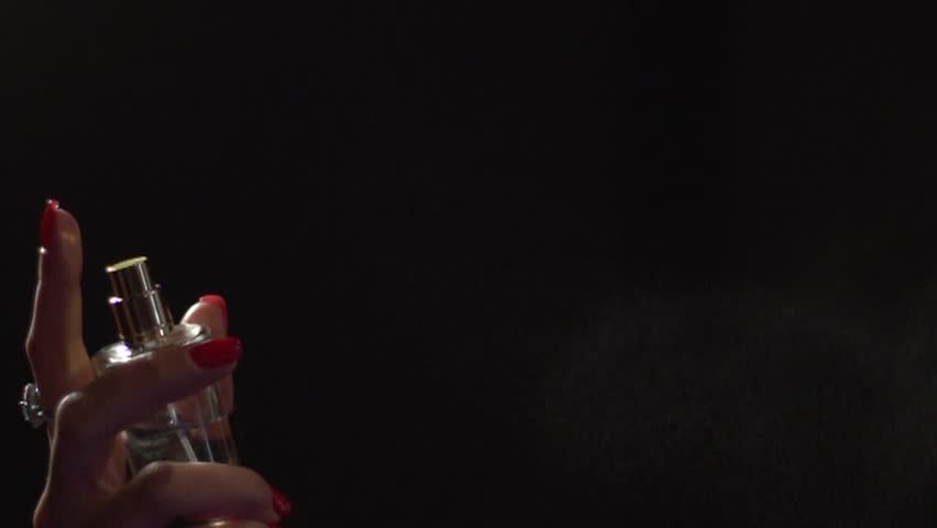 Spray Perfume in the Dark Stock Footage Video (100% Royalty-free ...