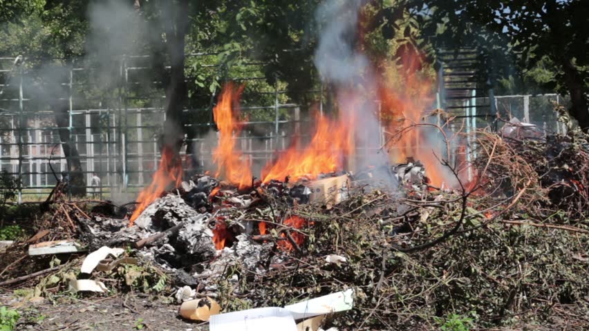 fire dump in illegal burning waste Stock Footage Video (100% Royalty ...