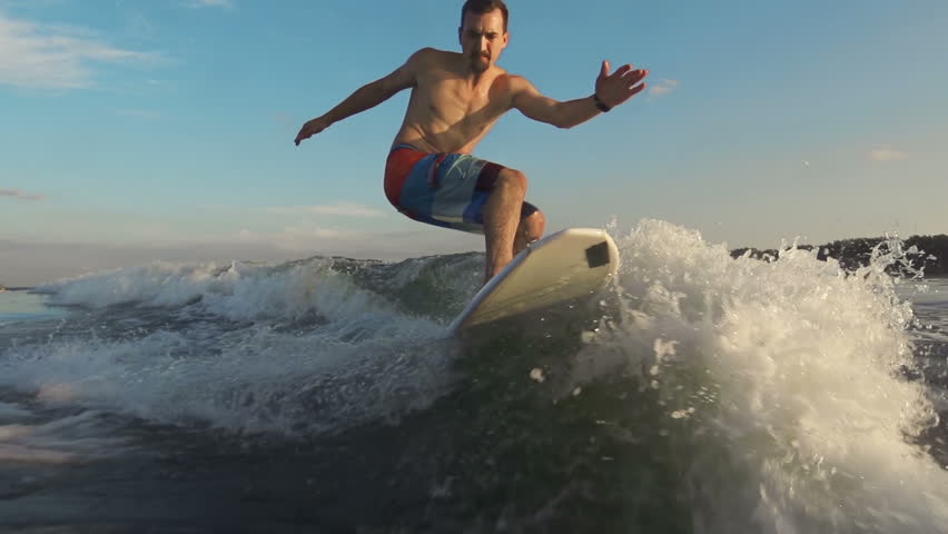 Slow Motion of Surfer Gliding 스톡 동영상 비디오(100% 로열티 프리) 7194928 ...