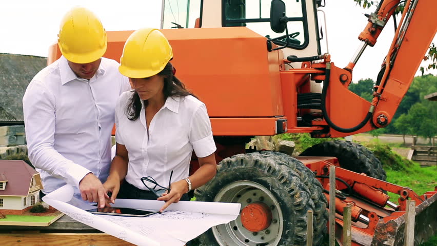 couple engineers discussing project on construction Stock Footage Video ...