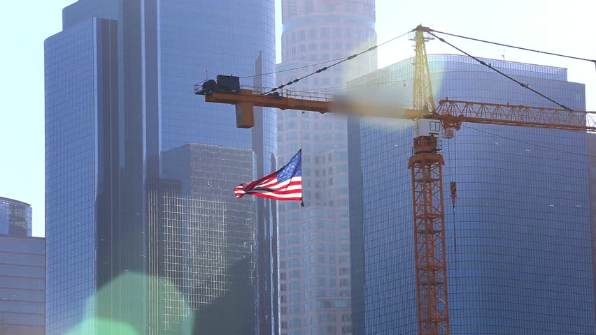 American Flag Flies from Construction Stock Footage Video (100% Royalty ...