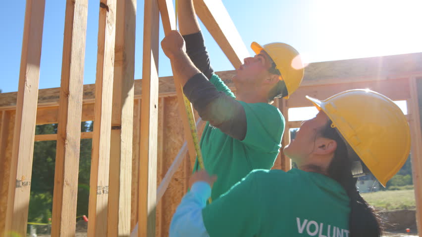 Volunteers Working Together On Construction Stock Footage Video (100% ...