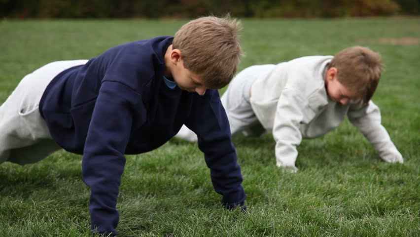 Young Children Exercising Outdoors By Stock Footage Video (100% Royalty ...