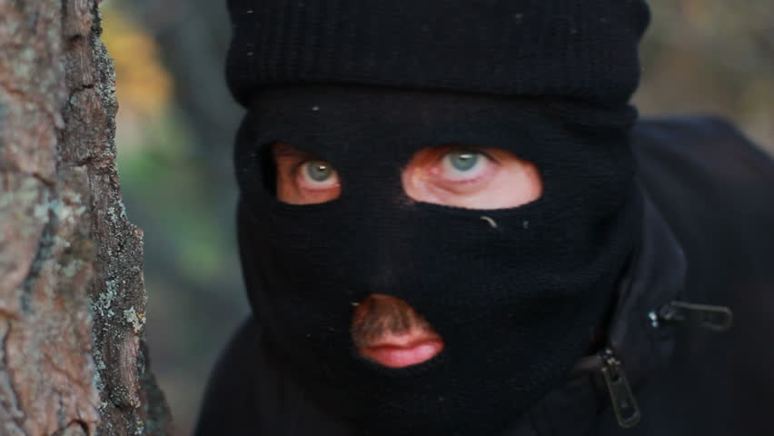 masked man robber criminal suddenly appears Stock Footage Video (100% ...