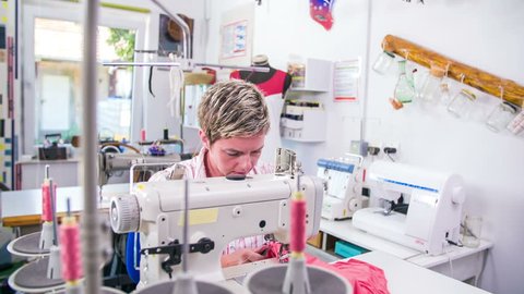 Professional Sewing Machine Studio Jib Shot Stock Footage Video (100% ...