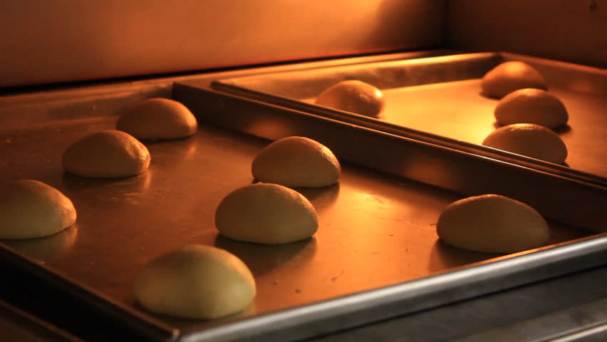 bread rolls inside oven chef close Stock Footage Video (100% Royalty ...