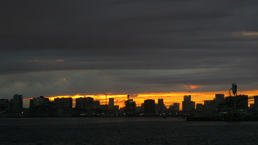 storm clouds slowly covering shoreline tokyo Stock Footage Video (100% ...