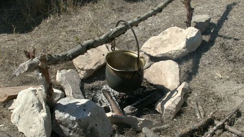 Cauldron Hanging Over Fire Stock Footage Video (100% Royalty-free ...