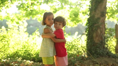 Brother Sister Hugging Tracking Shot Beautiful Stock Footage Video (100 ...