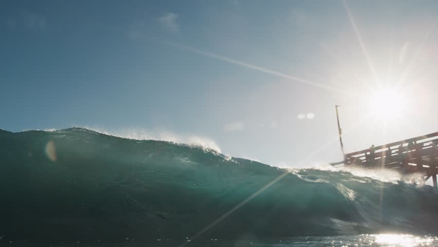 wave breaking on camera shot slow-motion Stock Footage Video (100% ...