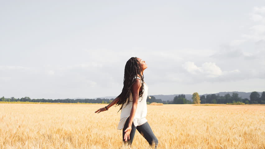 beautiful black woman running through wheat Stock Footage Video (100% ...