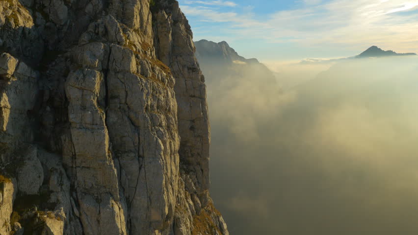 Aerial: Big Vertical Rock Wall Stock Footage Video (100% Royalty-free ...
