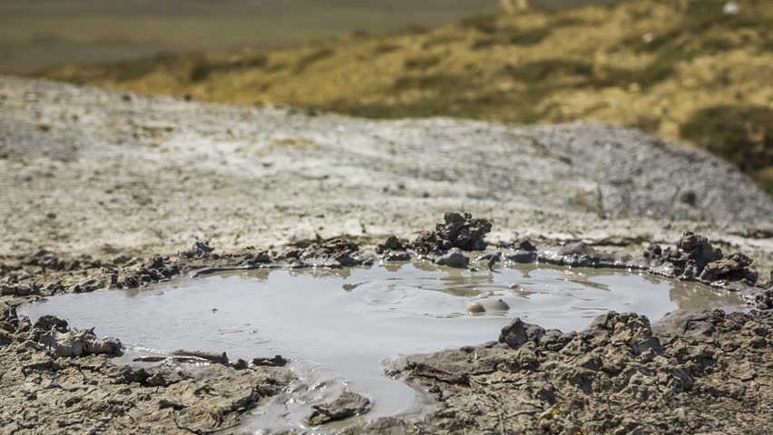 close-up shot mud puddle bubbles coming Stock Footage Video (100% ...