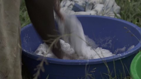 Ugandan Woman Washing Her Clothes Basin Stock Footage Video (100% ...