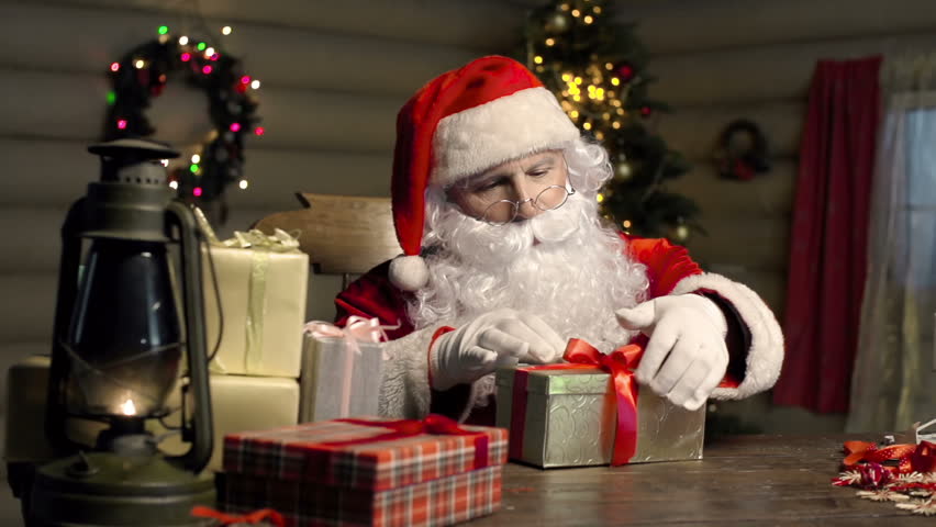 close santa claus packing gifts beautiful Stock Footage Video (100% ...