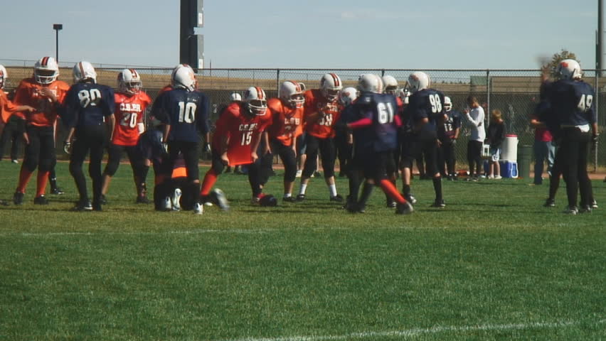 youth football teams enjoy full contact Stock Footage Video (100% ...