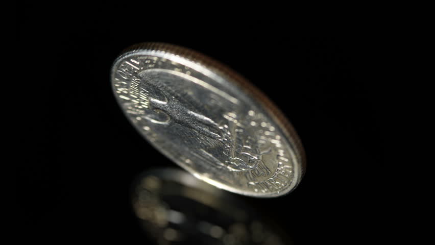 slow motion spinning coin quarter rotates Stock Footage Video (100% ...
