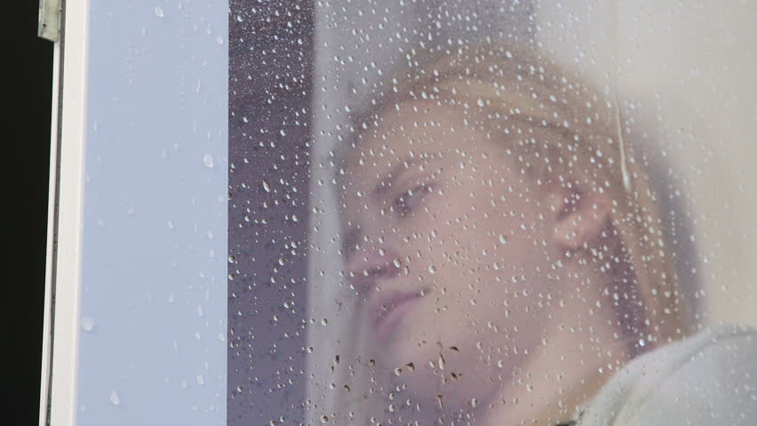 face sad teenage girl behind window Stock Footage Video (100% Royalty ...