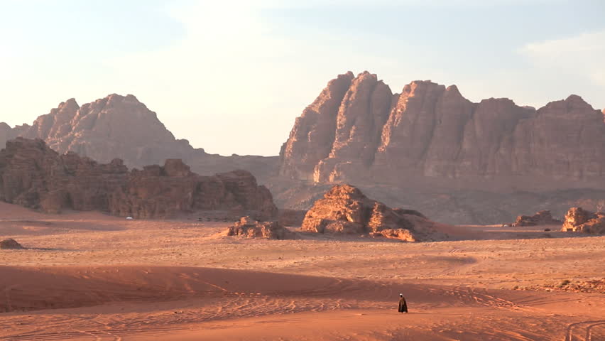 wadi rum lone bedouin walking valley Stock Footage Video (100% Royalty ...